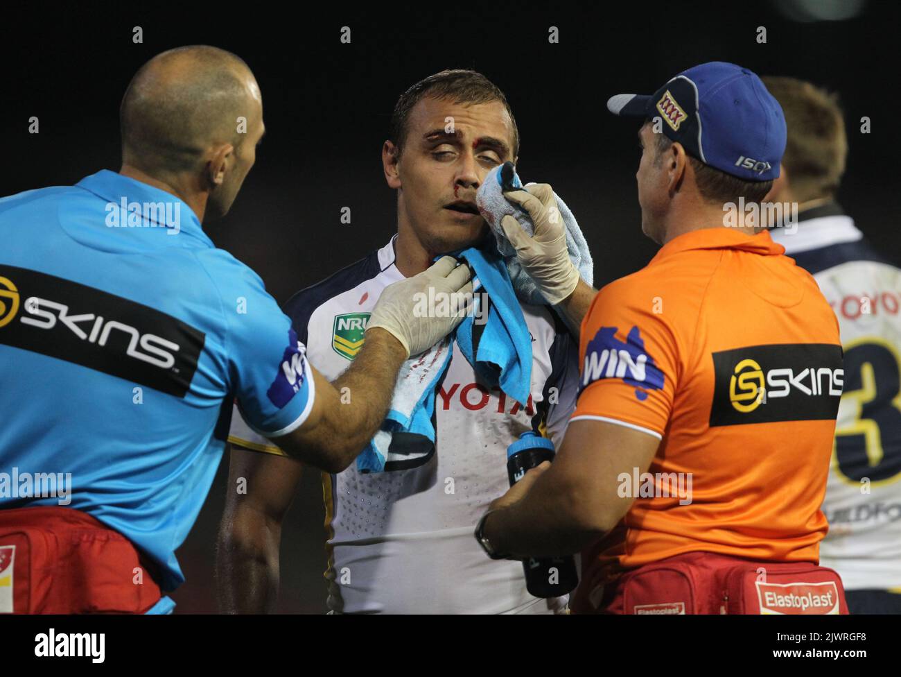 Anthony Mitchell gets treatment during the NRL Round 3 match between ...