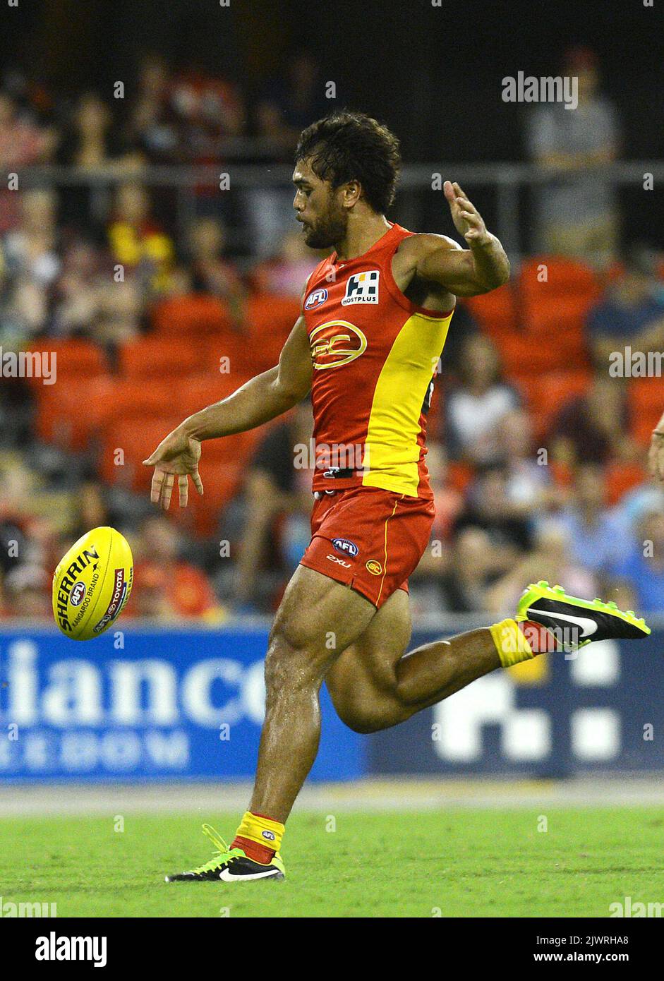 Suns' player Karmichael Hunt kicks during the round 1 AFL match between ...
