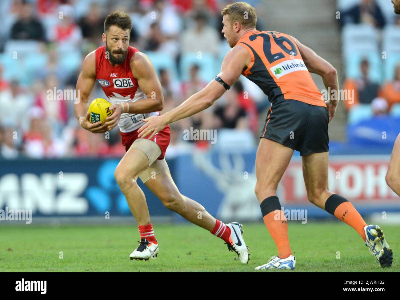 Sydney Swans' Nick Malceski looks for a way around the Greater Western ...