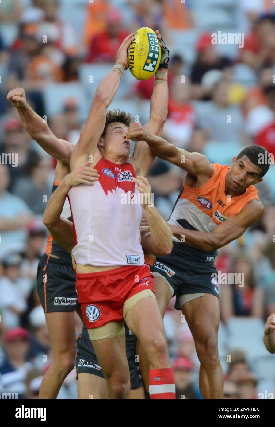 Sydney Swans' Mike Pyke takes a mark despite pressure from the Greater ...