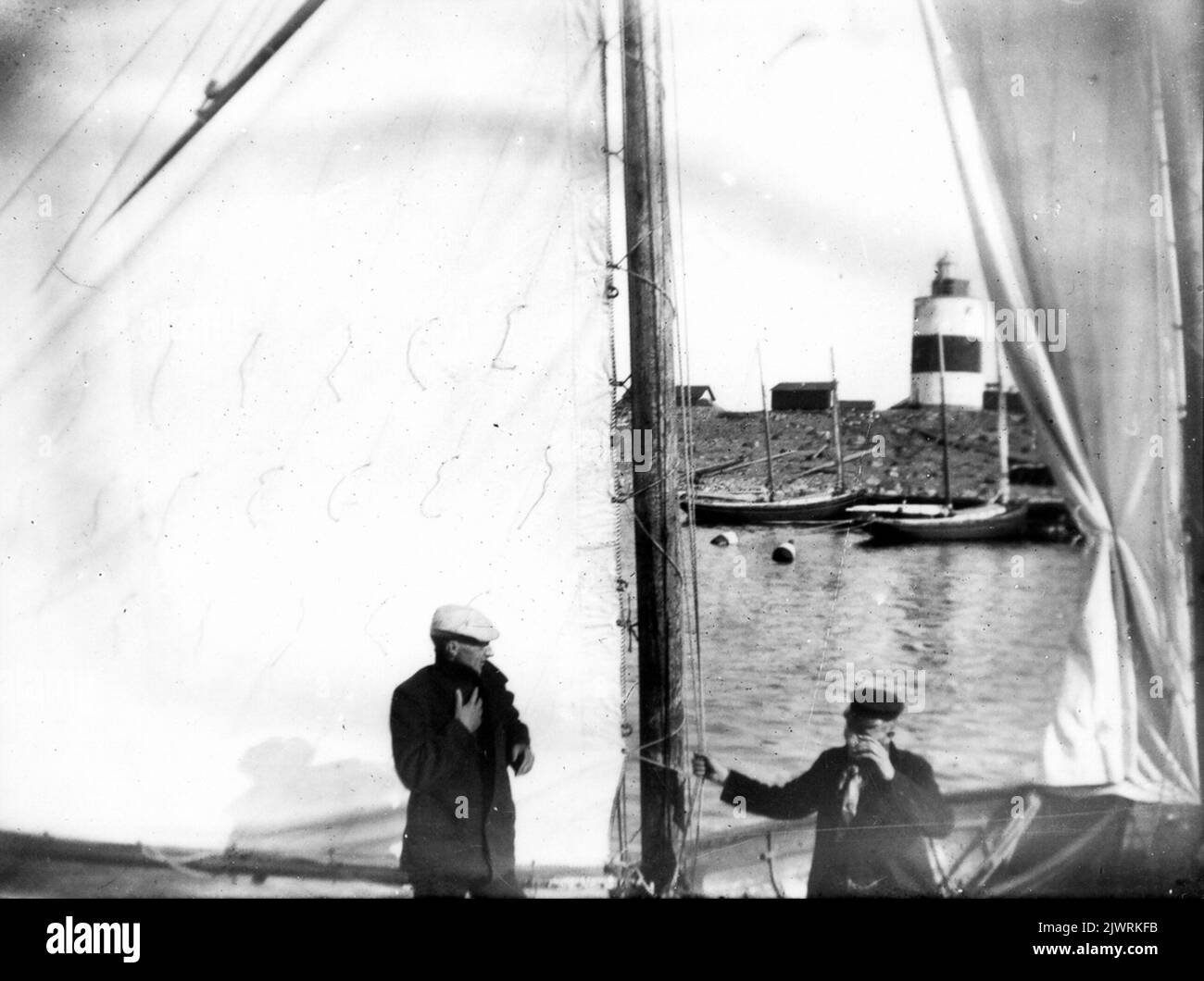 Two men sail Black and White Stock Photos & Images - Alamy