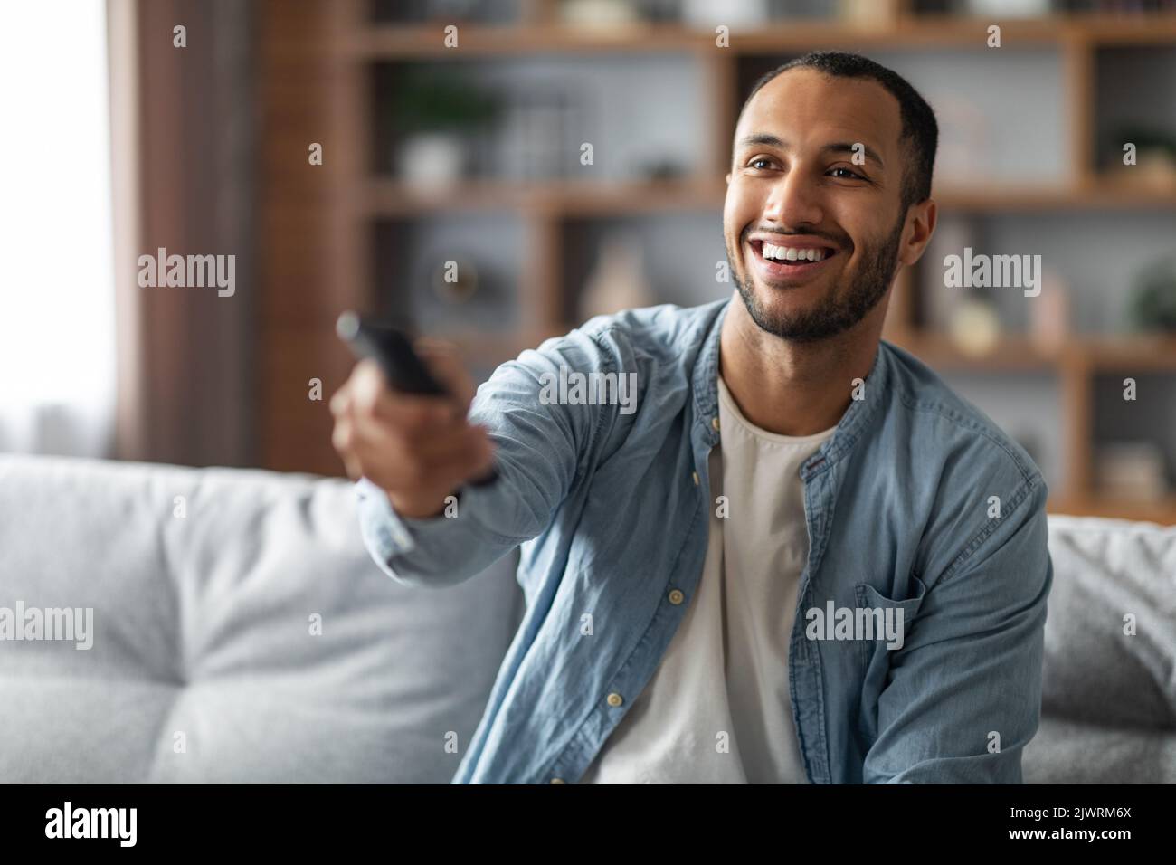 Portrait man remote control hi-res stock photography and images - Alamy
