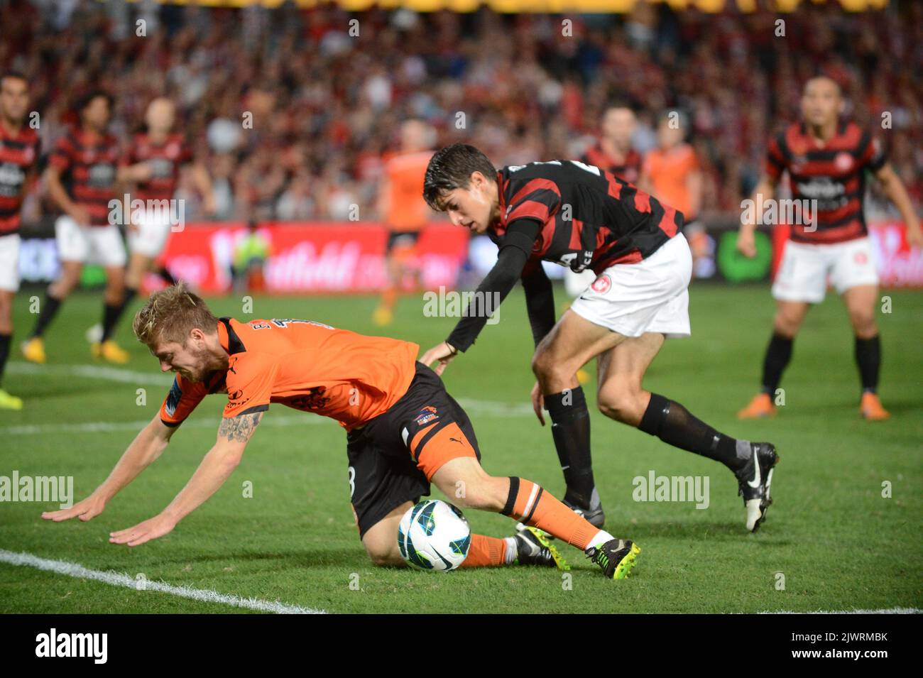 Western Sydney Wanderers' Yianni Perkatis and the Brisbane Roar's Luke ...