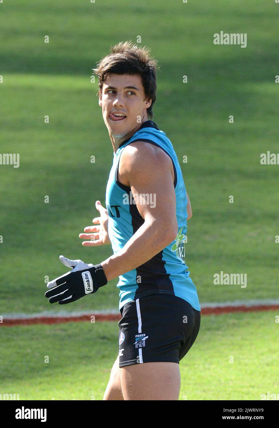 Angus Monfries looks on during the Port Adelaide training session at ...