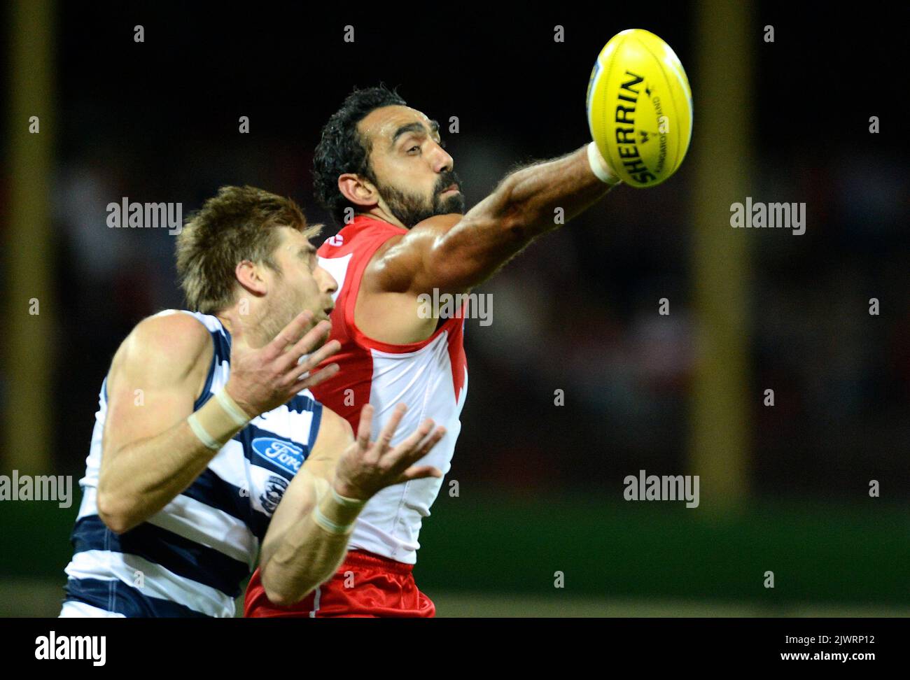 Sydney Swans' Adam Goodes spoils a mark by Geelong's Corey Enright ...