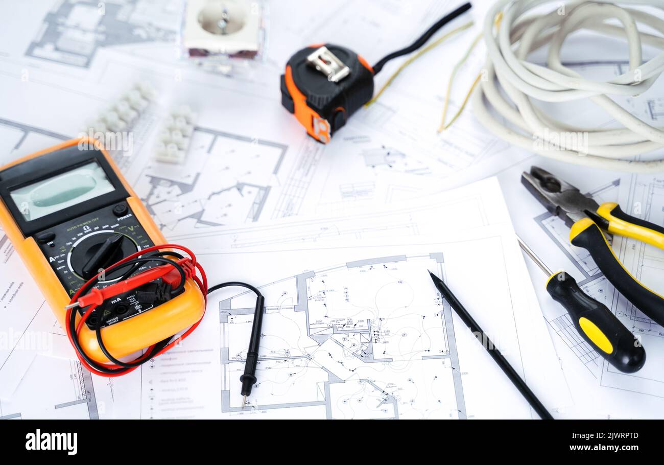 Making repairs,planning electricity project in house.Drawings,diagrams ...