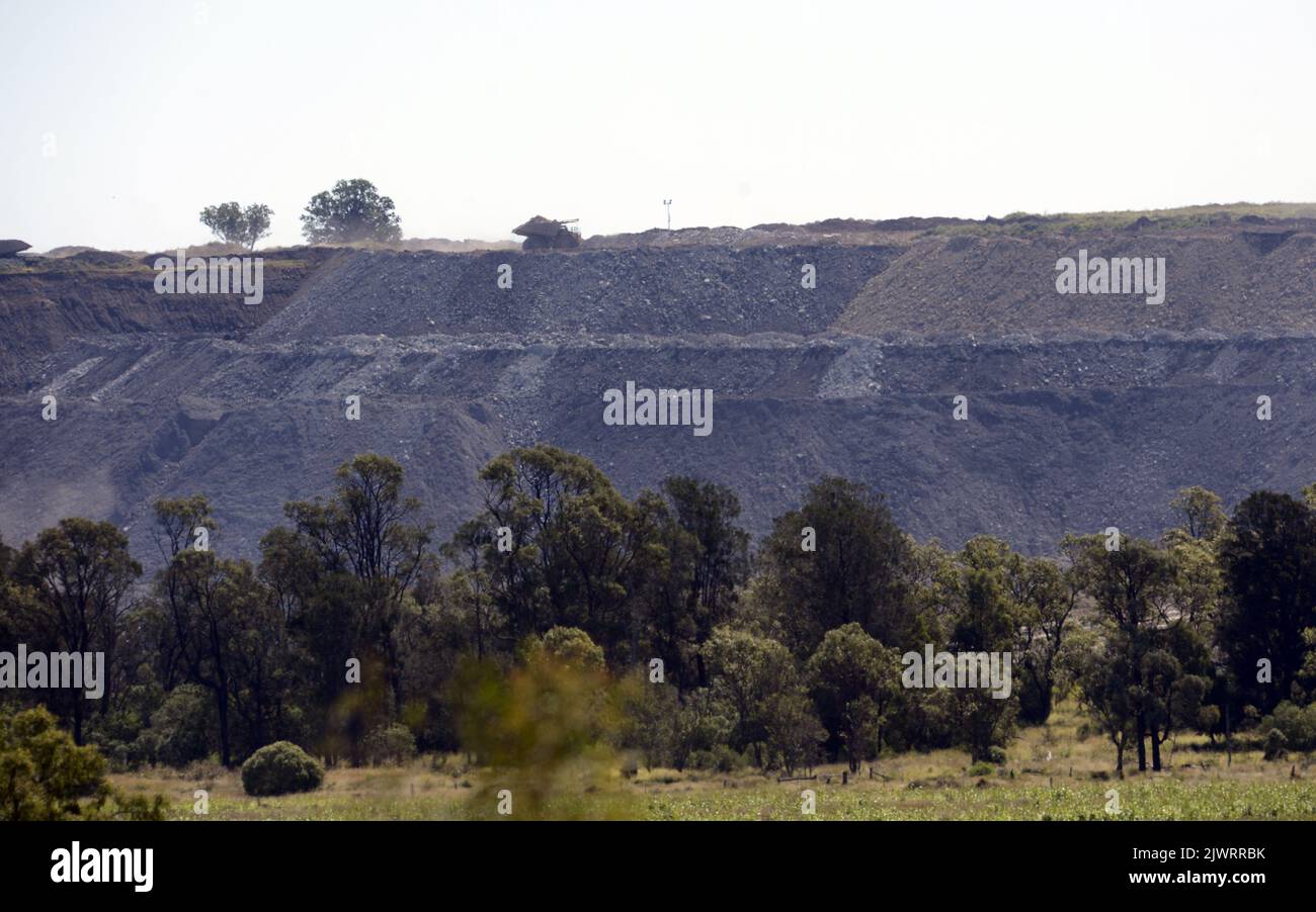 The New Acland coal mine is seen behind abandoned fields in Acland ...