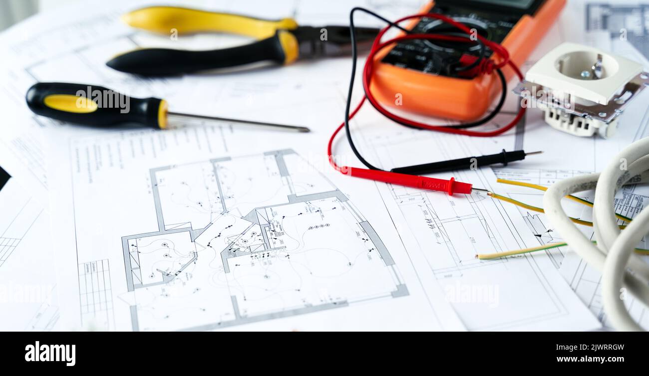 Making repairs,planning electricity project in house.Drawings,diagrams ...