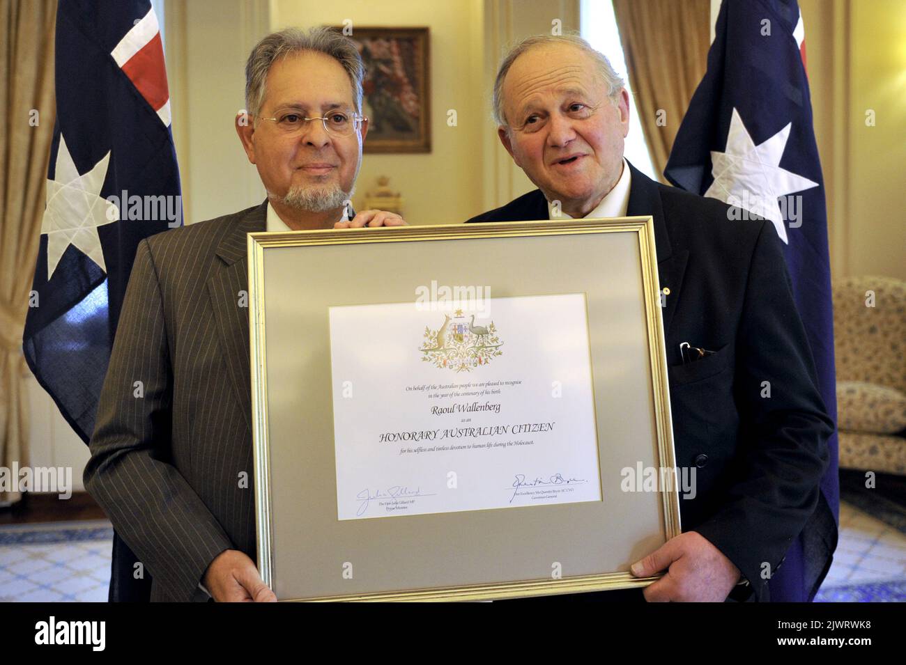 Professor Frank Vajda and George Farkas hold the citizenship ...