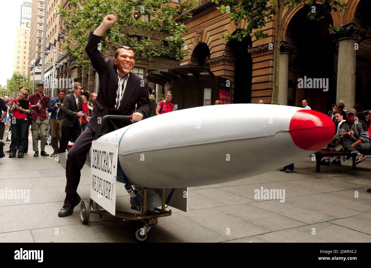 PA PHOTOS / AAP - UK USE ONLY : A protester dressed as US president ...