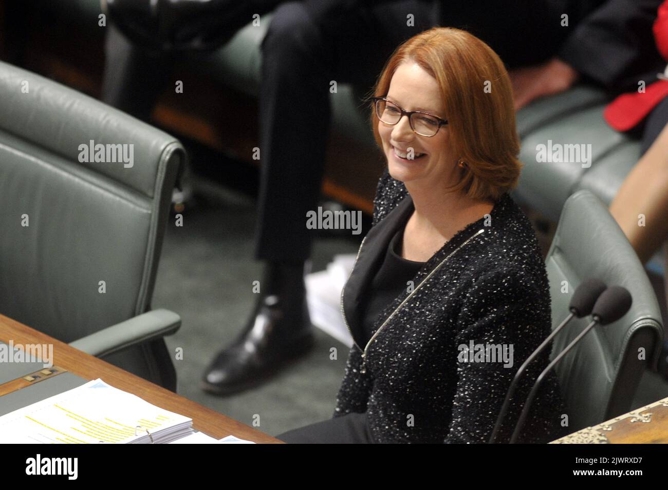 Prime Minister Julia Gillard laughs during House of Representatives ...