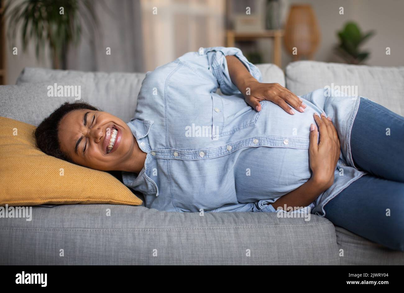 Pregnant African American Female Having Painful Contractions Spasm At ...