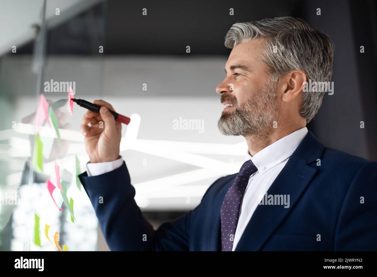 Bearded middle aged man writing hi-res stock photography and images - Alamy