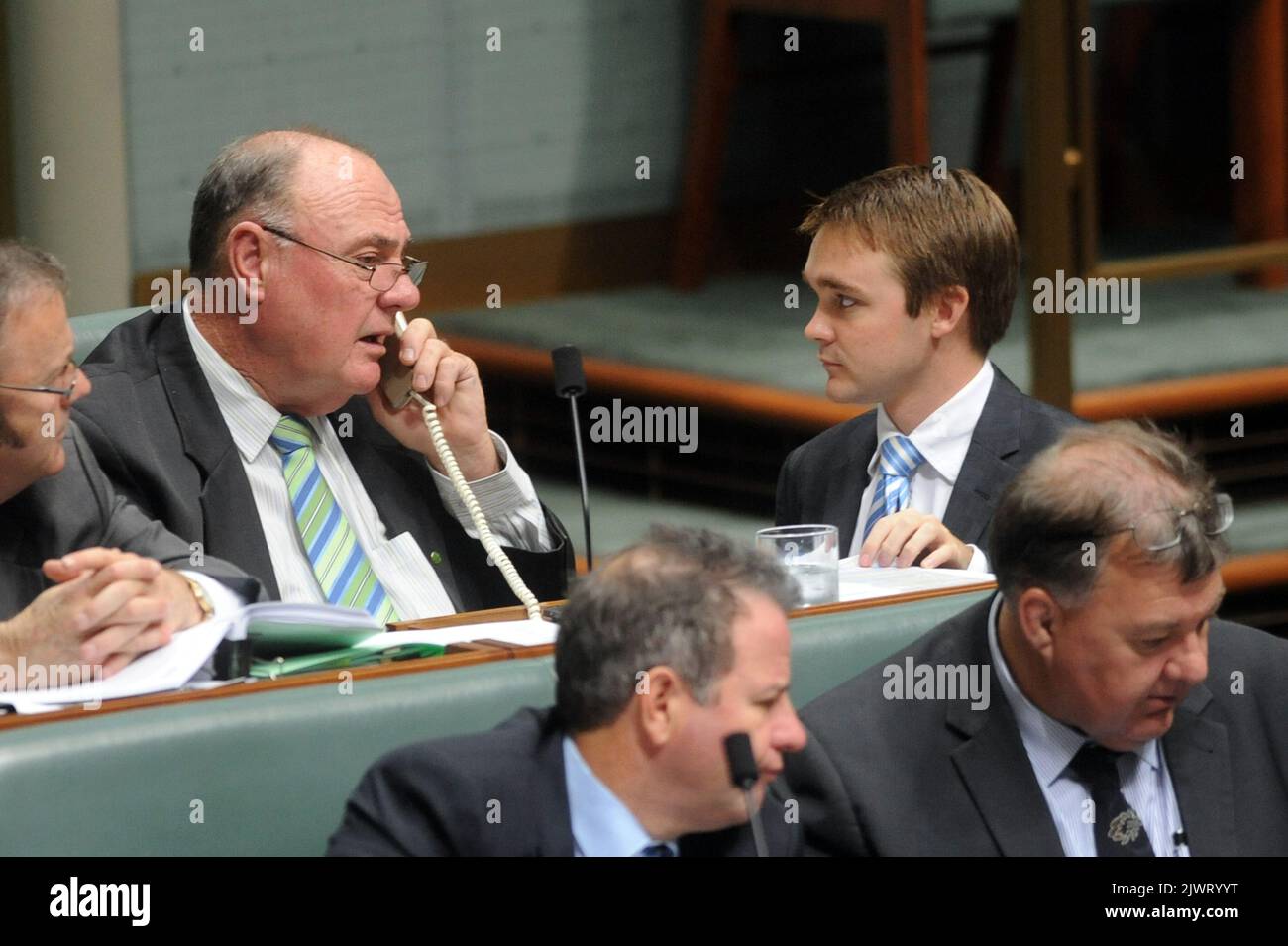 The youngest member of parliament Wyatt Roy (right) listens to the ...