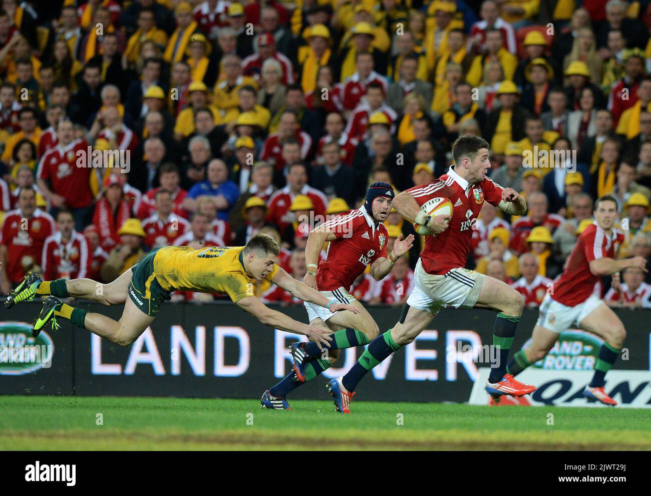 Alex Cuthbert escapes an attempted tackled by James O'Connor during the ...