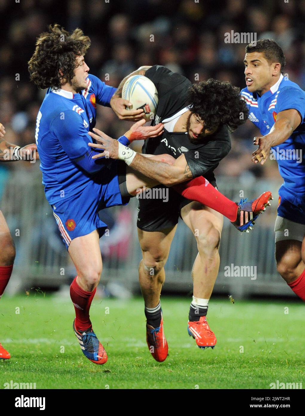 Rene Ranger breaks the tackle of Maxime Machenaud during the third test ...