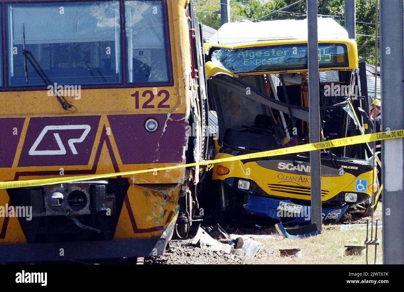 PA PHOTOS / AAP - UK USE ONLY : A Queensland Rail passenger train and a ...