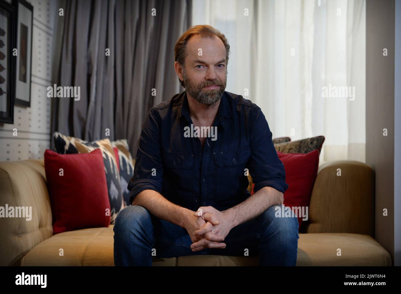 Actor Hugo Weaving poses for a photograph in Sydney, Wednesday, Aug. 7 ...