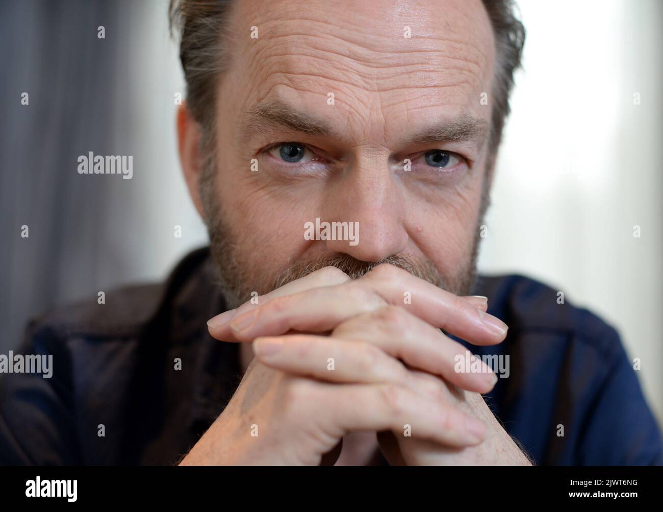 Actor Hugo Weaving poses for a photograph in Sydney, Wednesday, Aug. 7 ...