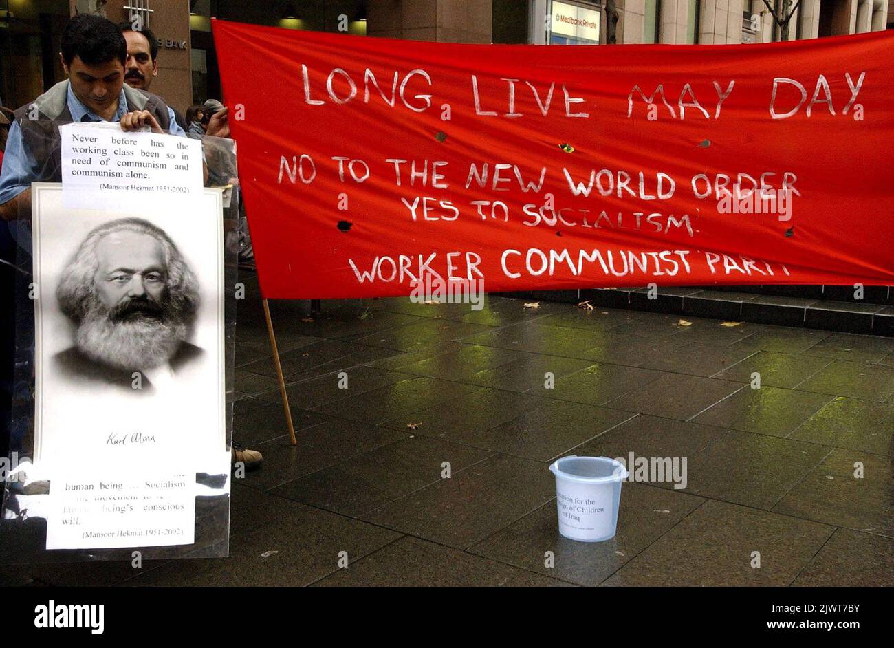 PA PHOTOS / AAP - UK USE ONLY : An activist holds a picture of ...