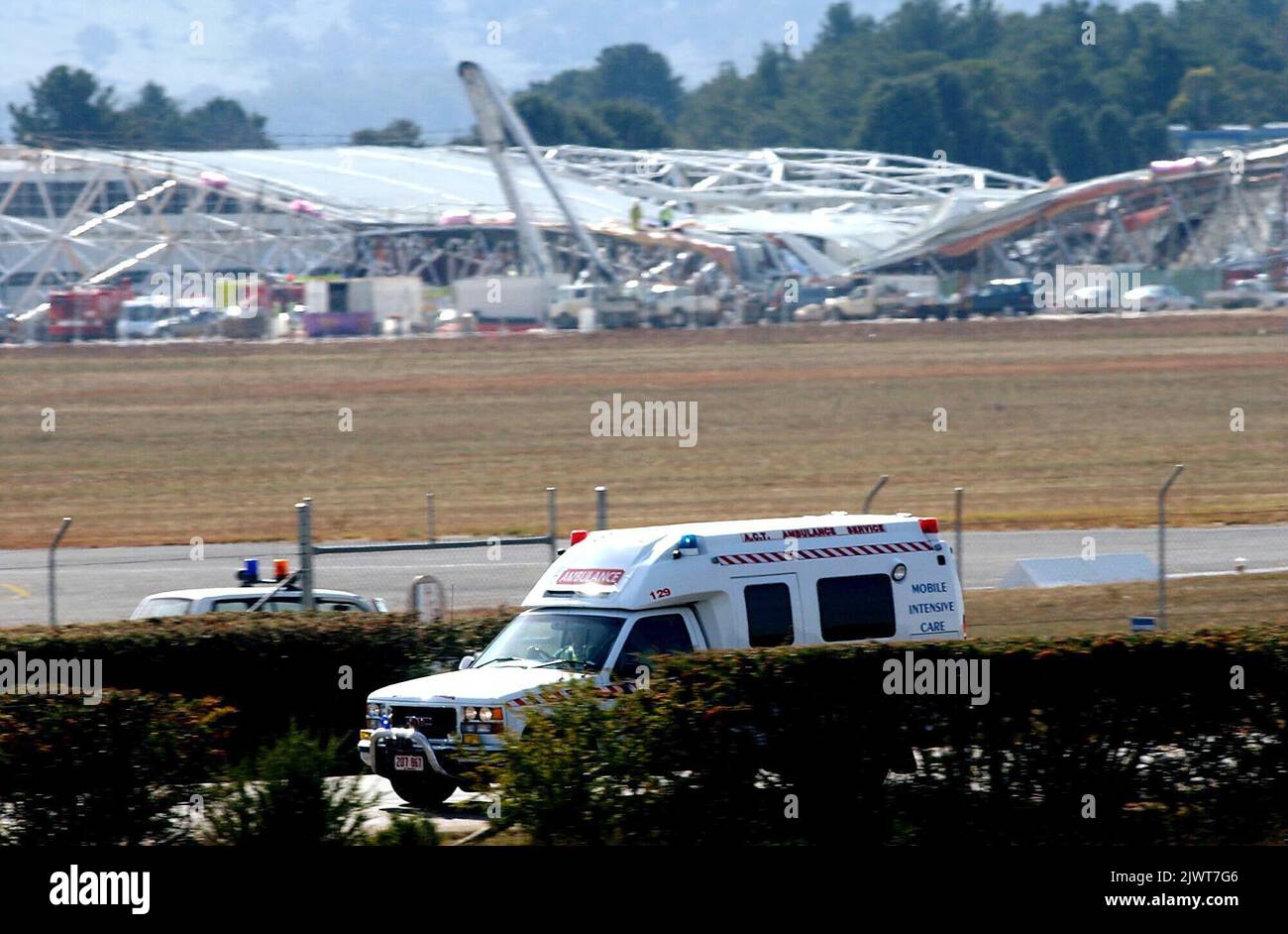 PA PHOTOS/AAP - UK USE ONLY: An ambulance carries injured workers past ...