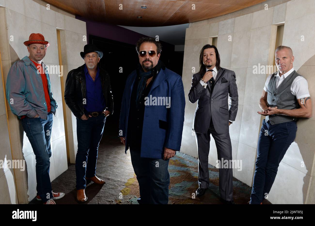 American band The Mavericks, led by frontman Raul Malo (centre) pose ...