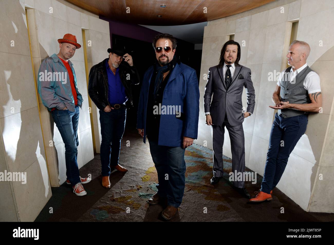 American band The Mavericks, led by frontman Raul Malo (centre) pose ...