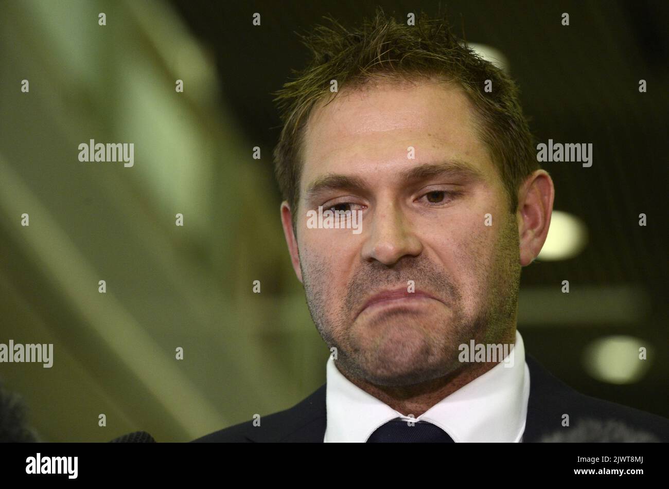 Australian fast bowler Ryan Harris arrives at Brisbane airport ...