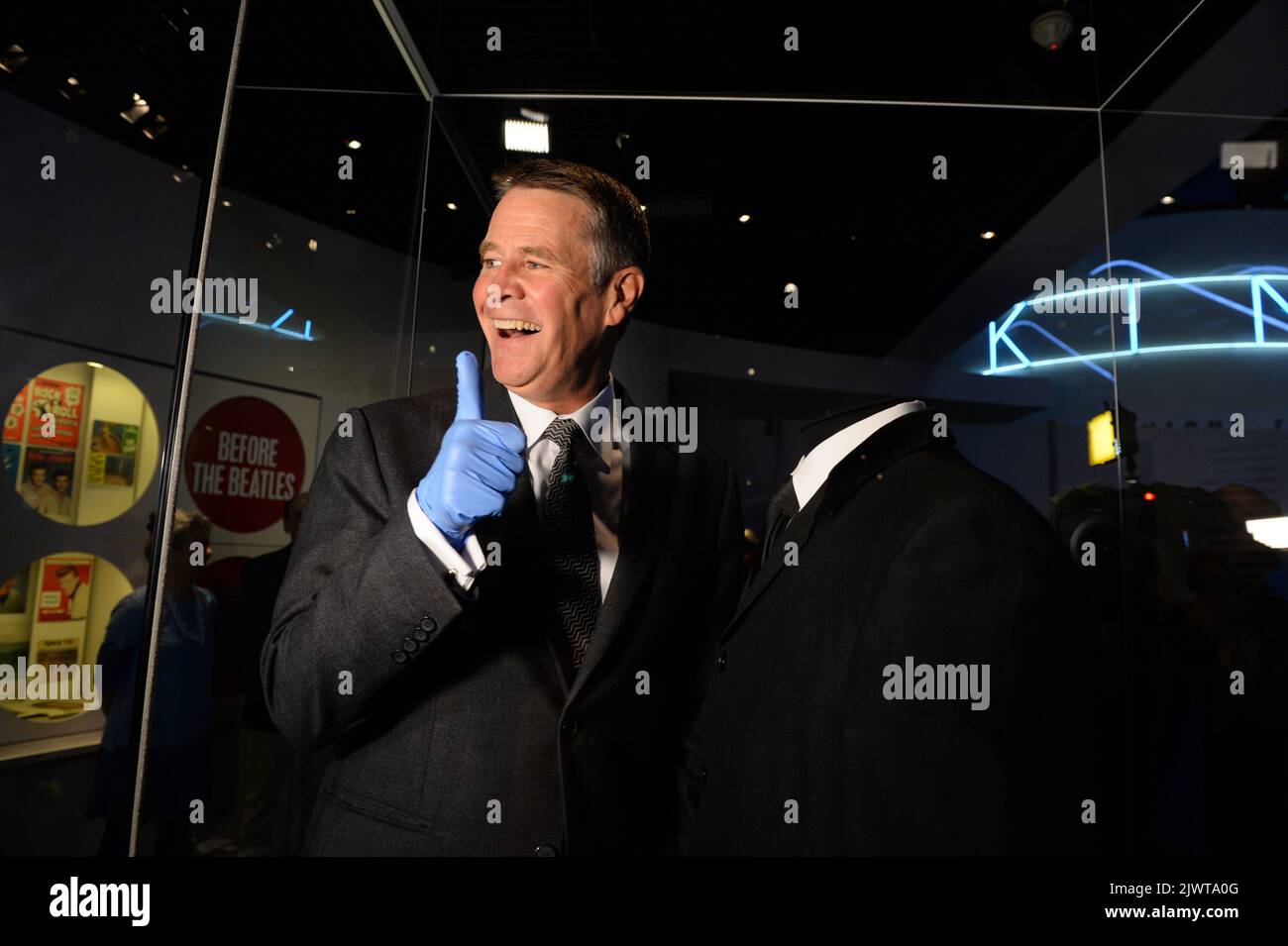 NSW Deputy premier Andrew Stoner puts the final touches on an exhibit ...
