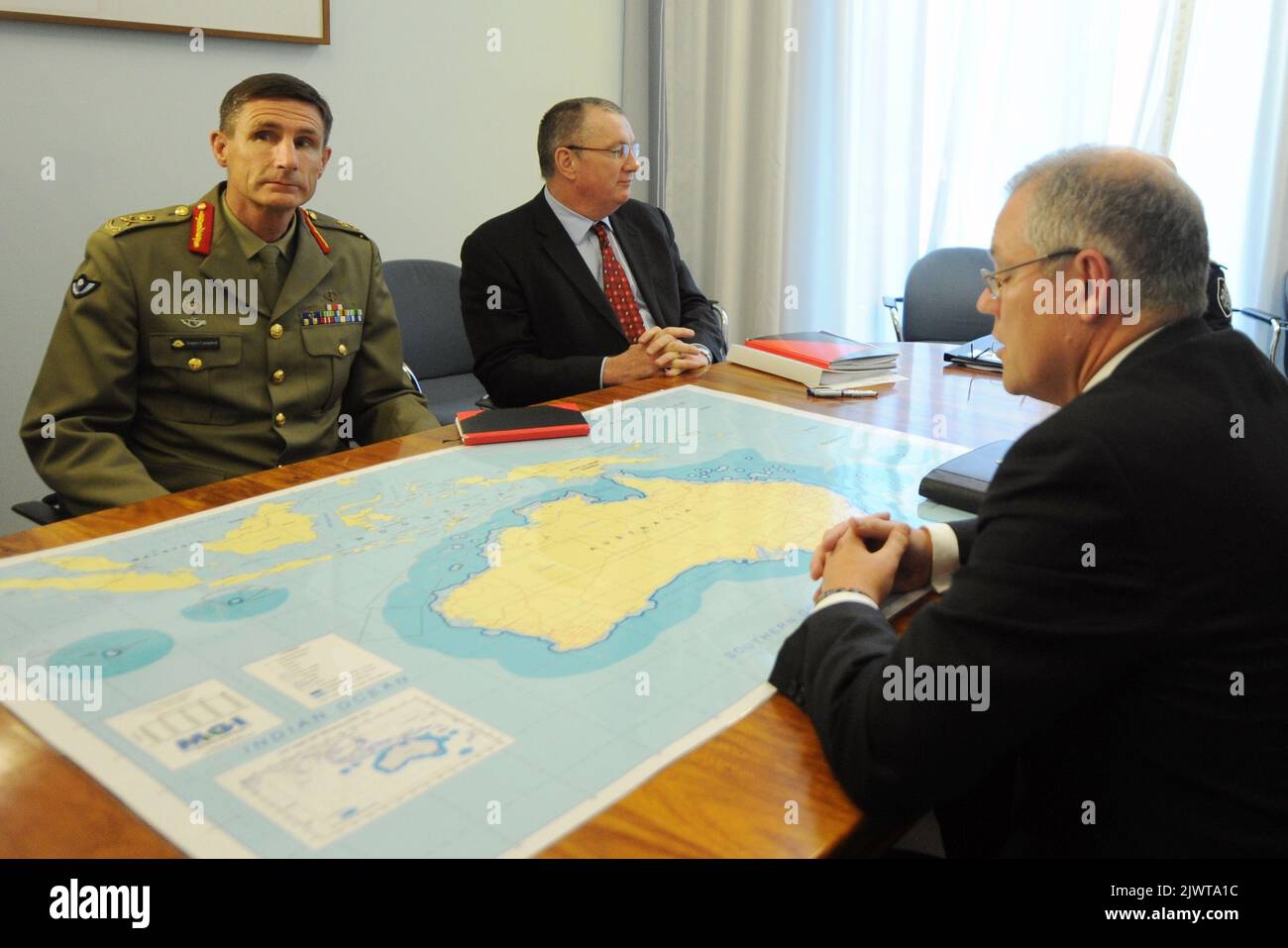 Minister for Immigration Scott Morrison (right) meets with newly ...