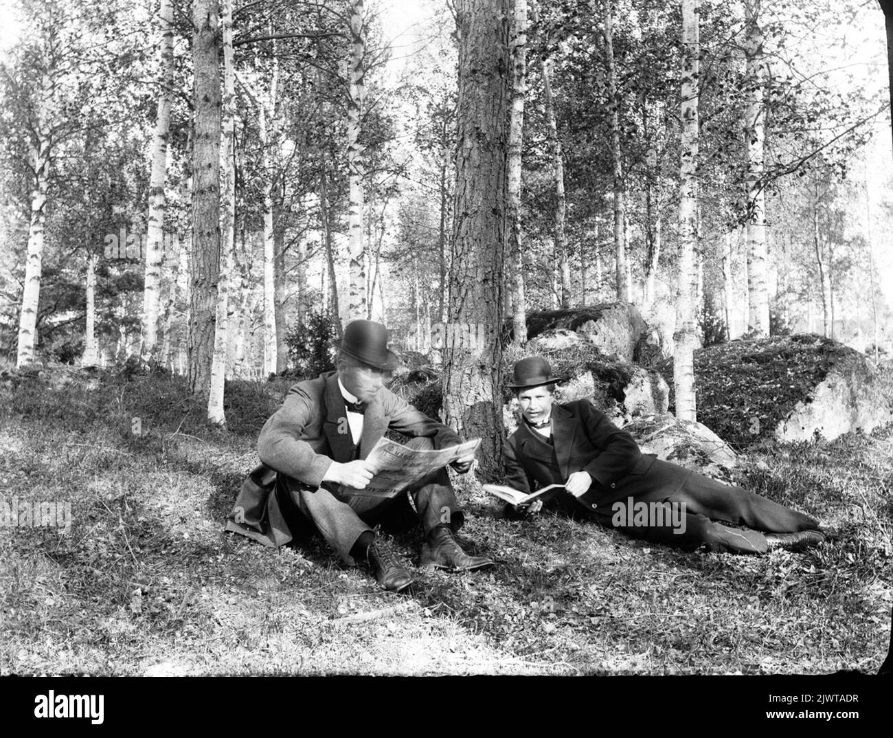 Two man in forest Black and White Stock Photos & Images - Alamy