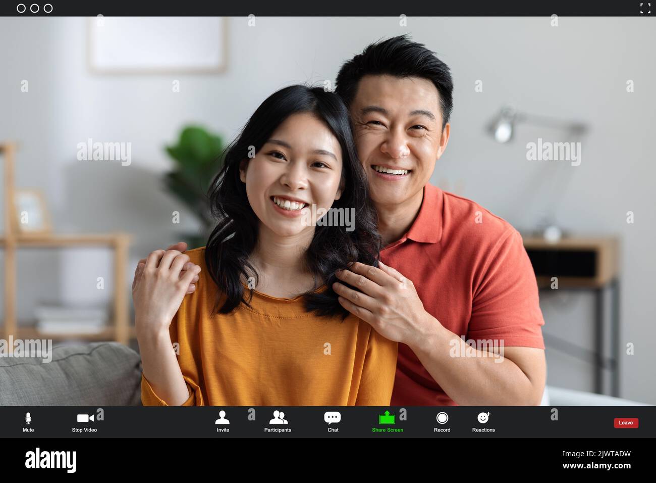 Cheerful korean couple having video conference with friends, screenshot ...