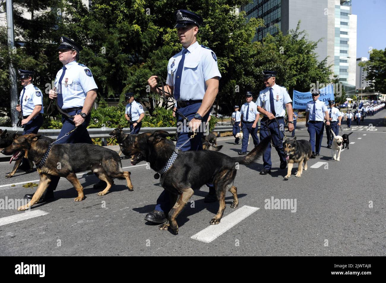 Members of the Queensland Police march to commemorate National Police ...