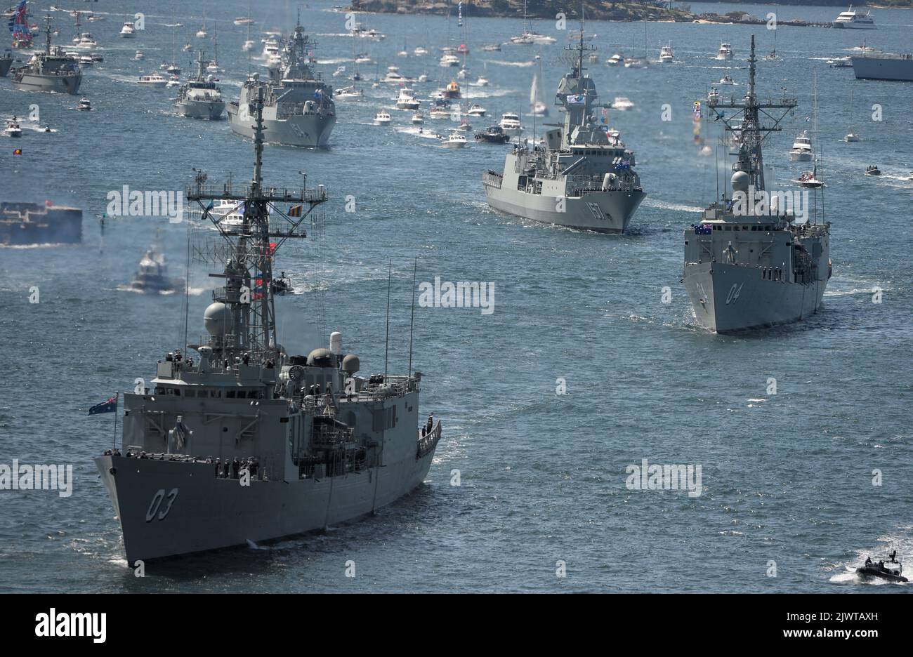 Royal Australian Navy ship HMAS Sydney leads the ceremonial fleet into ...