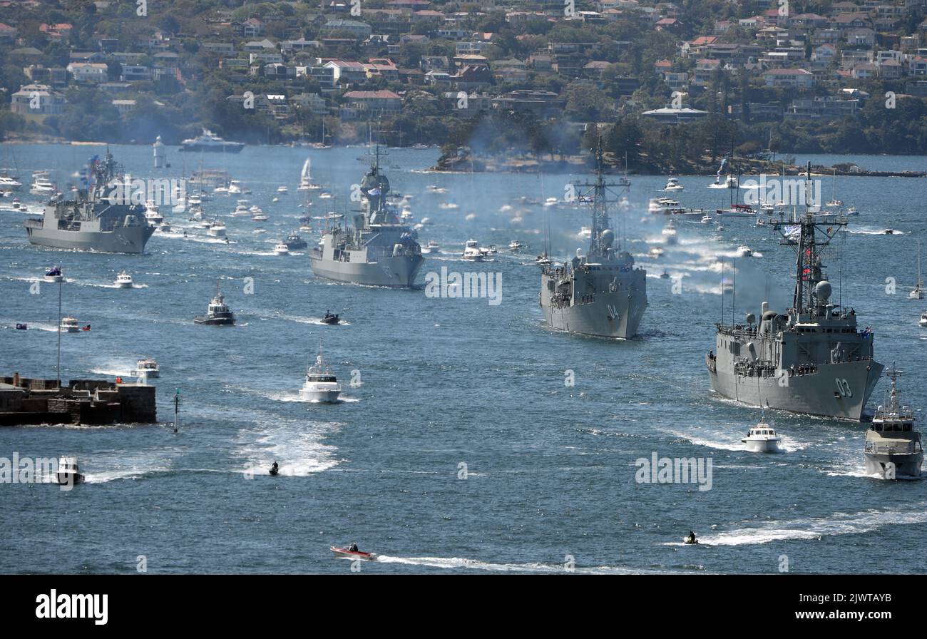 Royal Australian Navy ship HMAS Sydney leads the ceremonial fleet into ...