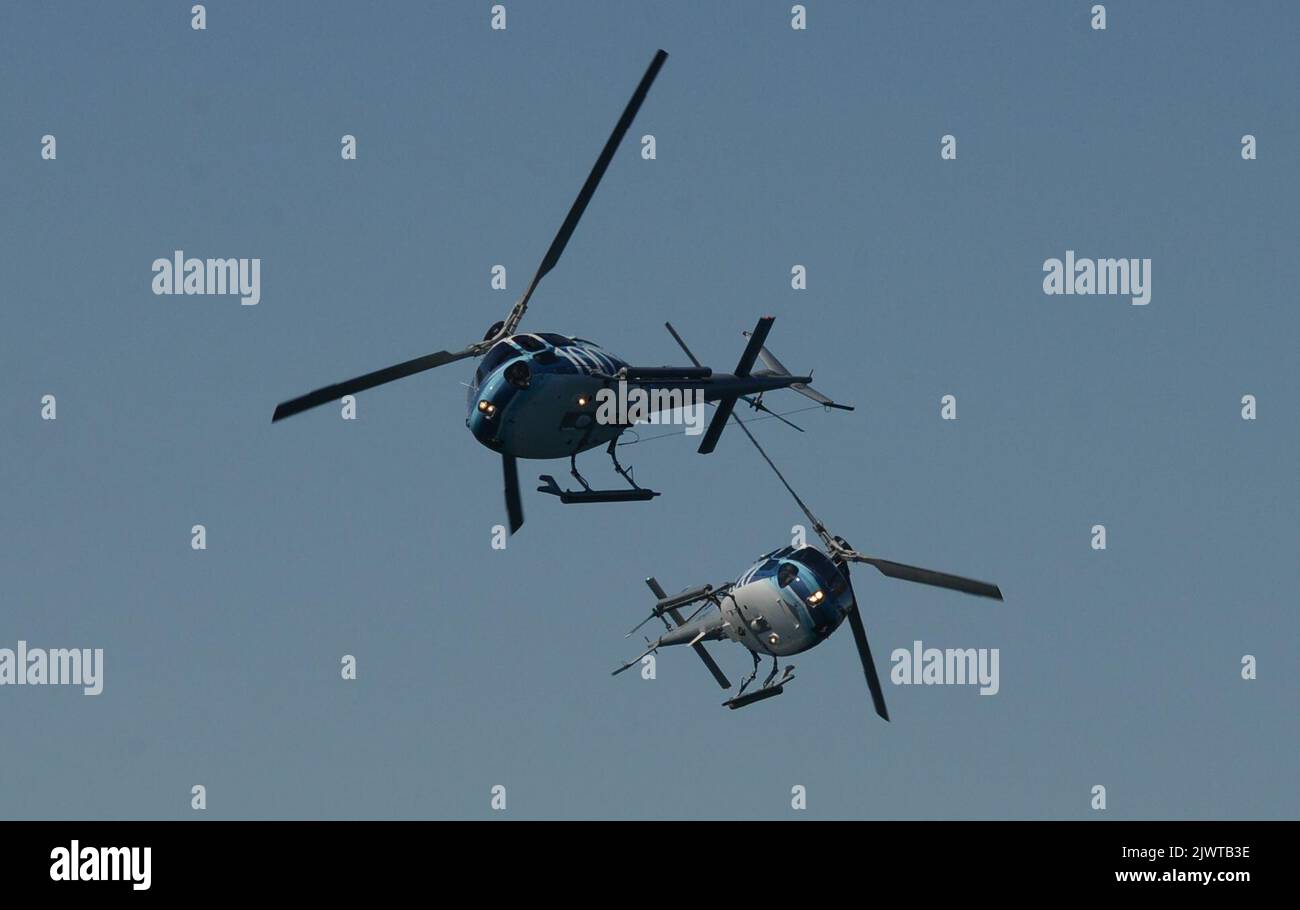 Royal Australian Navy helicopters perform above Sydney Harbour during ...