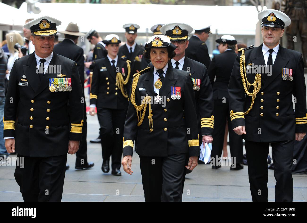 NSW Governor Marie Bashir (centre) leaves the Navy Memorial Service at ...