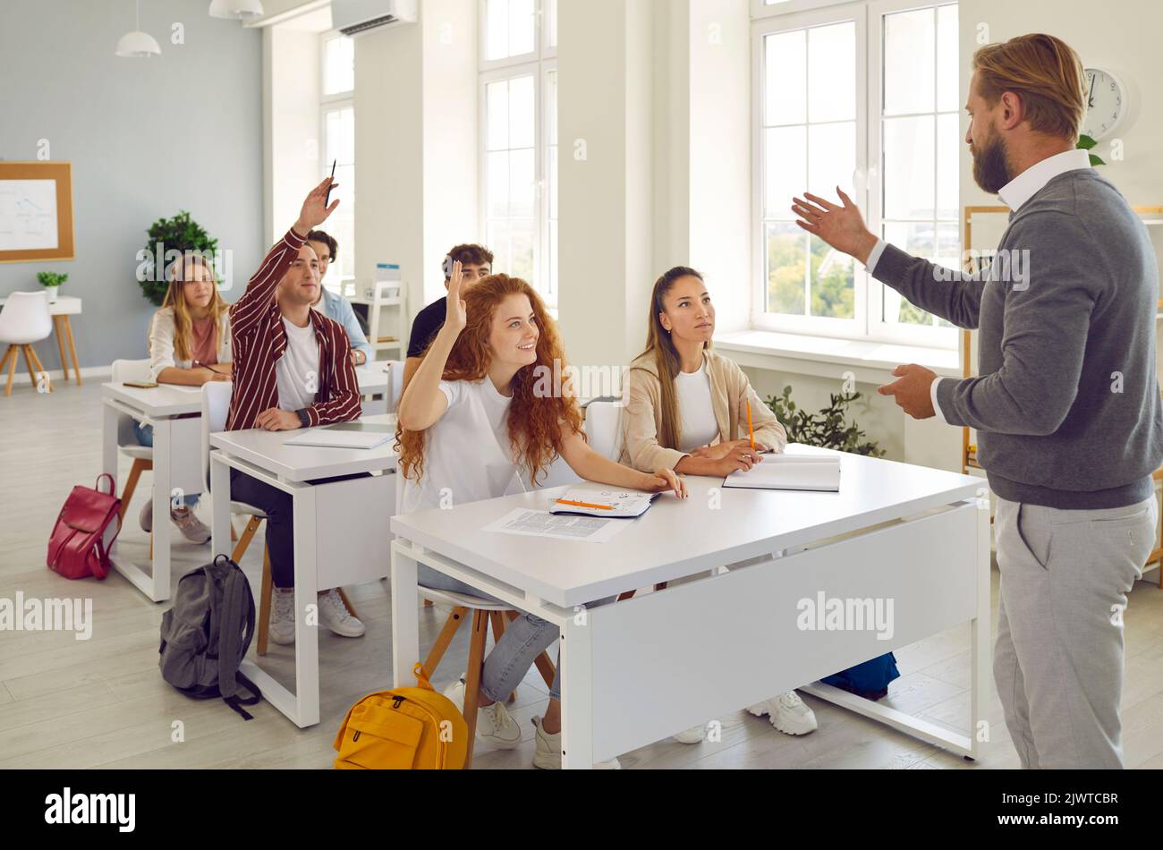 Group of students answer question hi-res stock photography and images ...