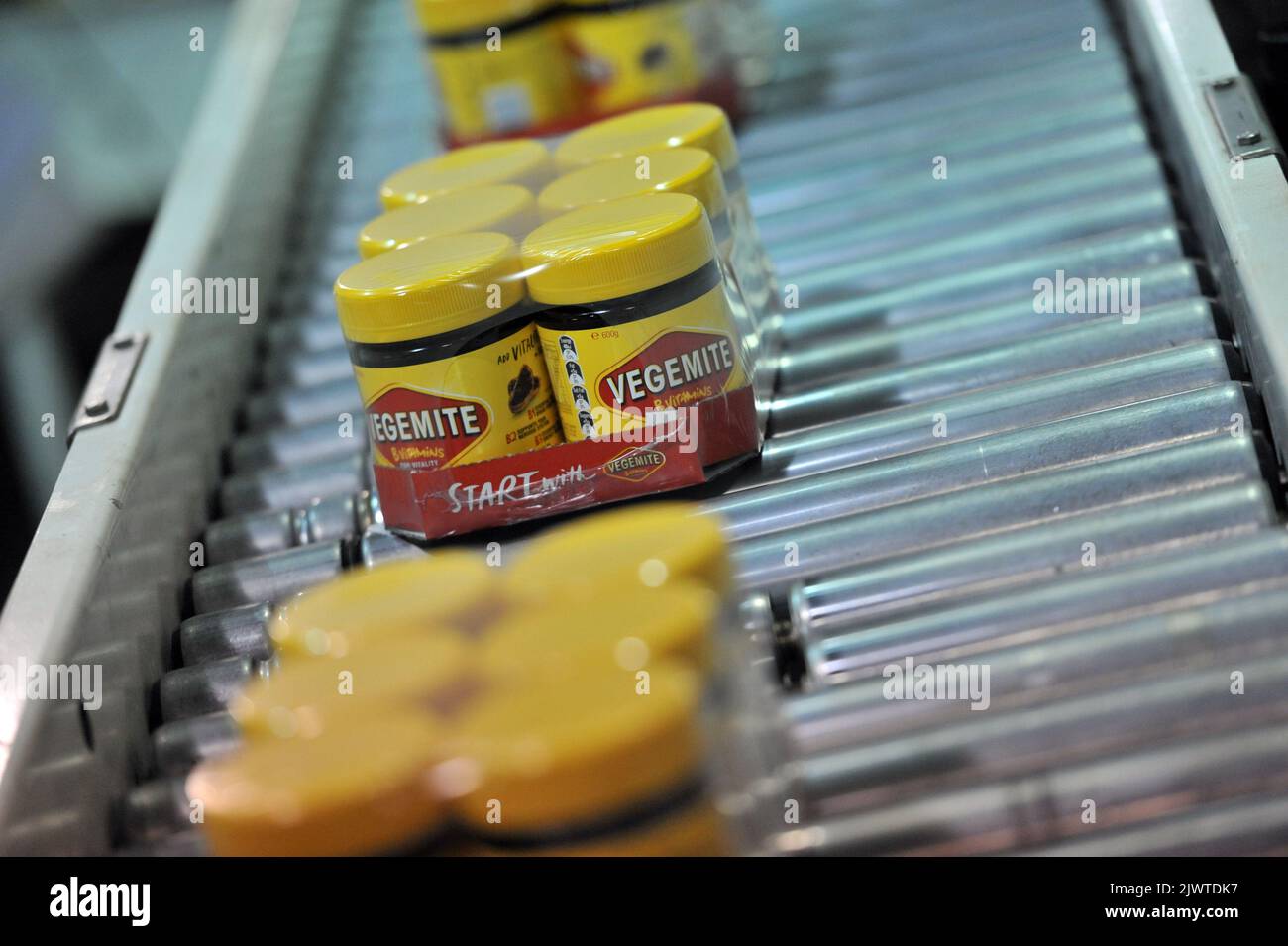 Vegemite rolls along production line at the Vegemite factory in ...