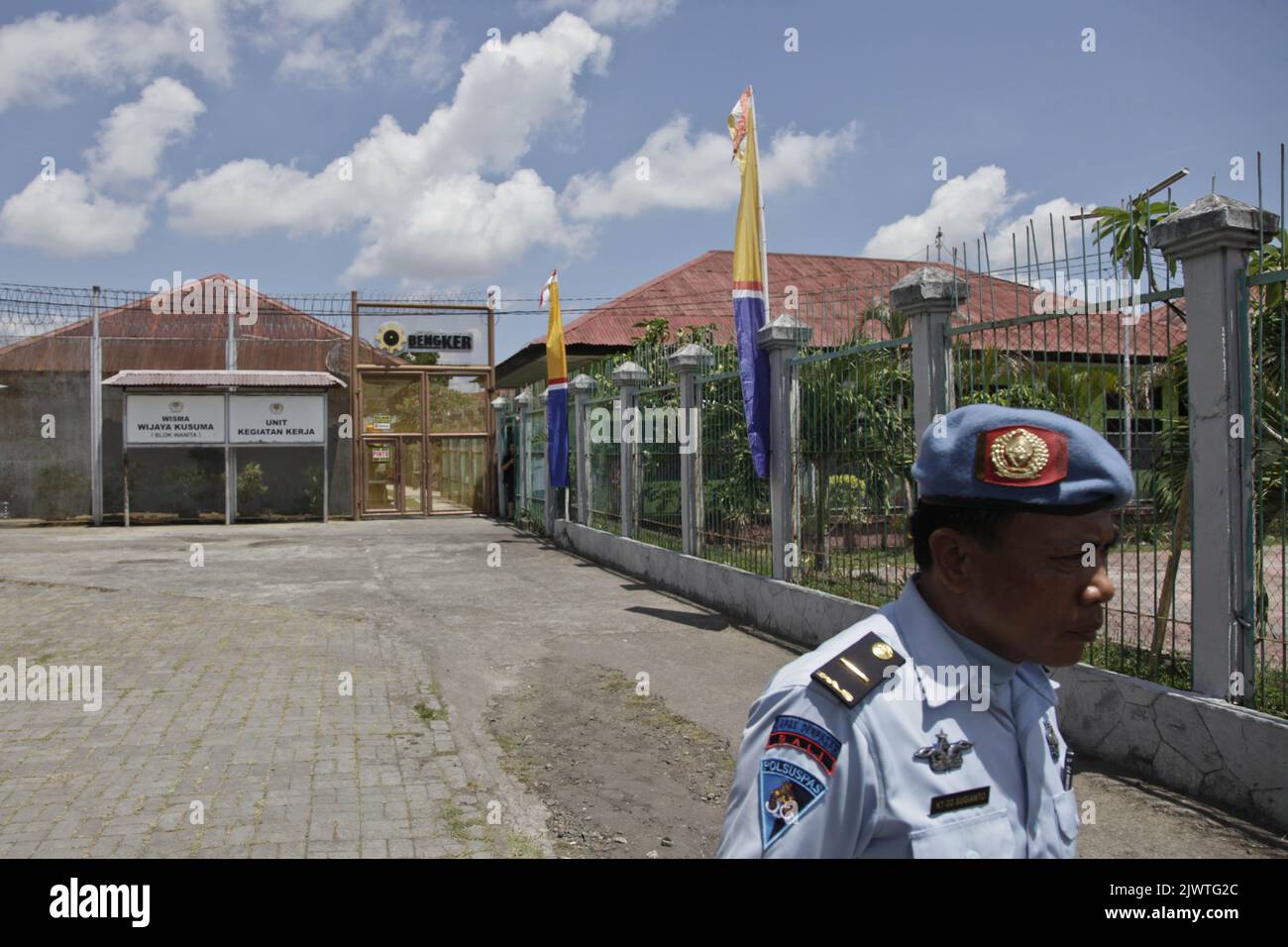 A prison guard patrols inside the Kerobokan Prison in Denpasar, Bali ...