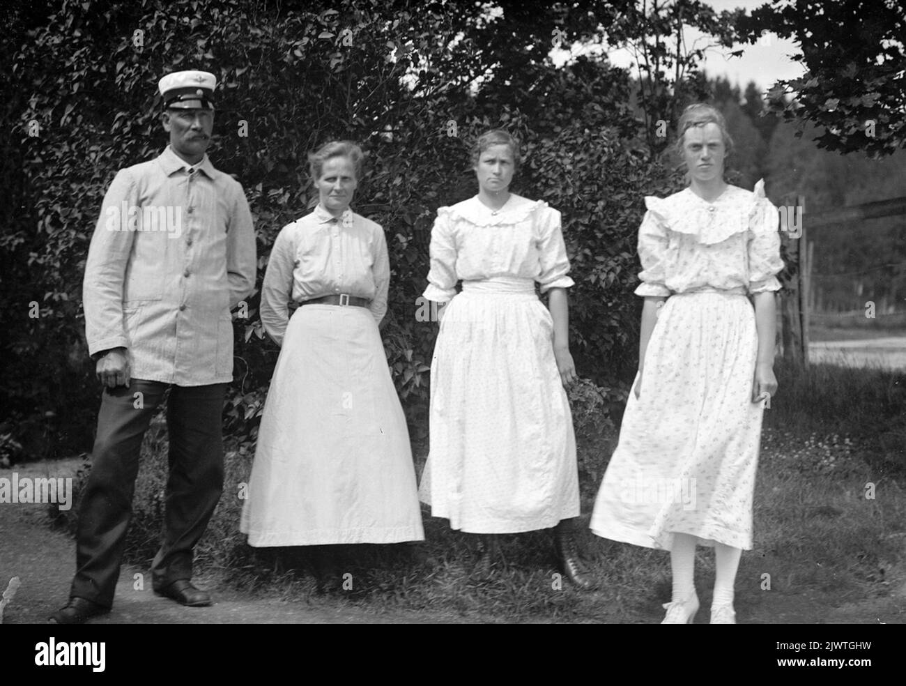 From left Karl and Maria Strand, Mårtsbo. Unknown. Daughter Elsa ...