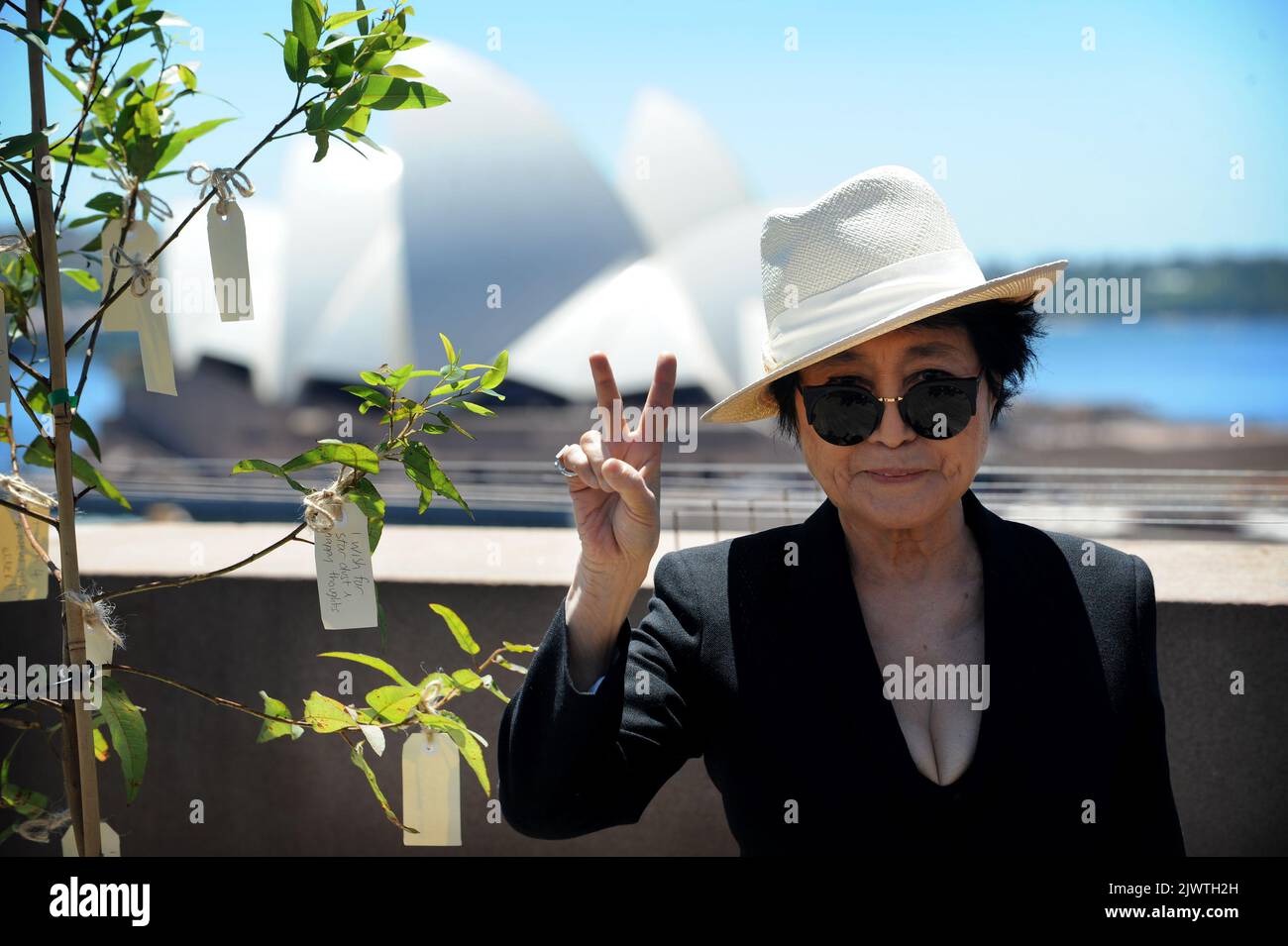 Yoko Ono poses for a photograph at the launch of her art exhibition ...