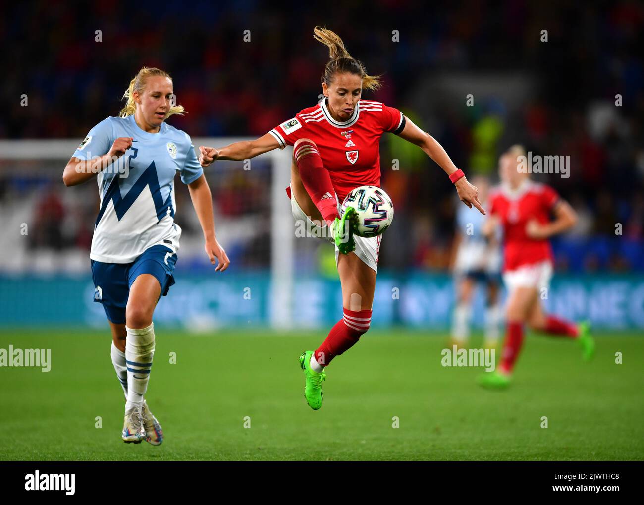 Slovenia's Lana Golob (left) and Wales' Ceri Holland battle for the ball during the 2023 FIFA ...