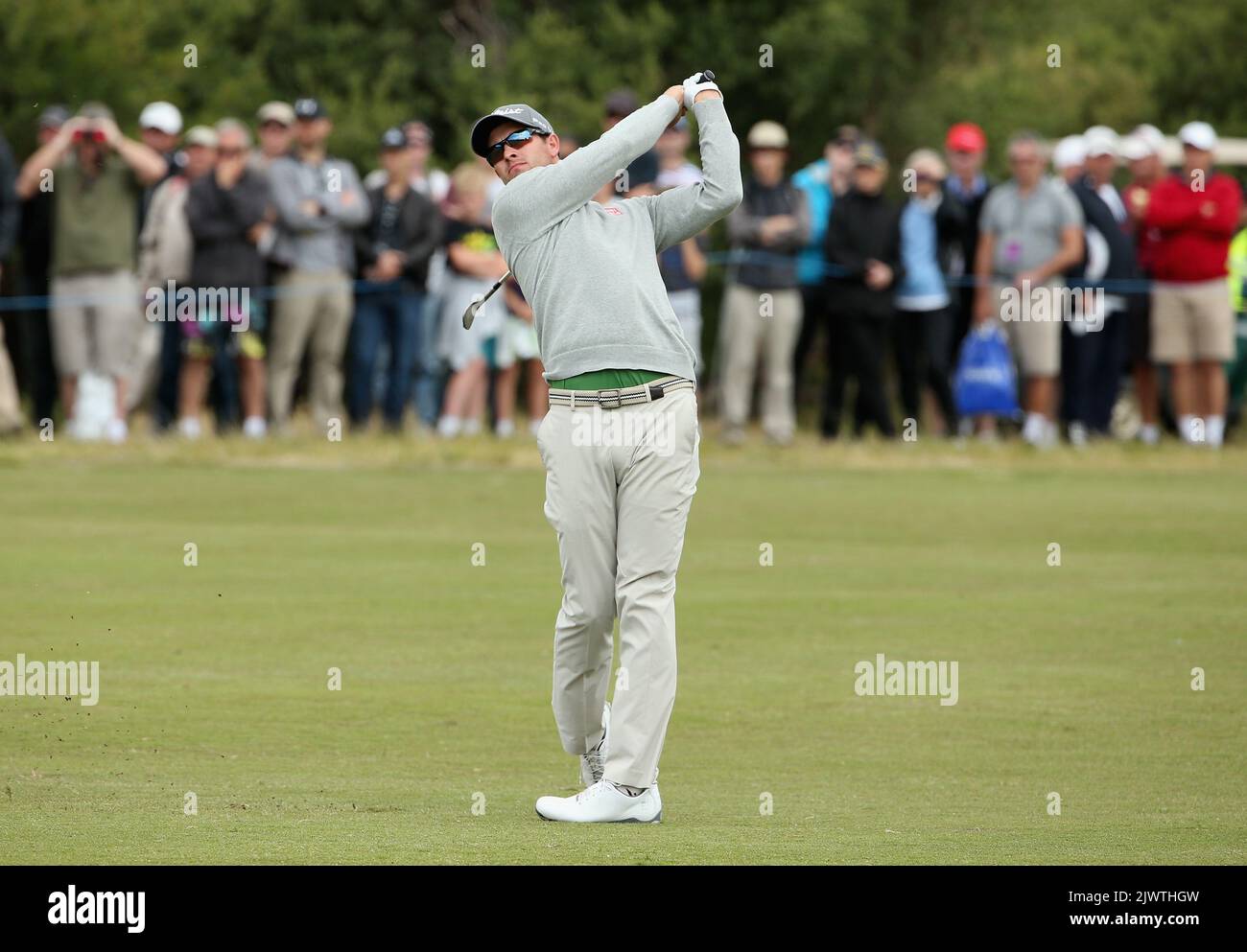 Adam Scott of QLD plays his second shot on the eighth during the ...