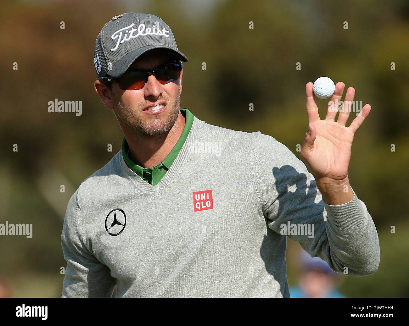Adam Scott of QLD acknowledges the crowd as he finishes his third round ...
