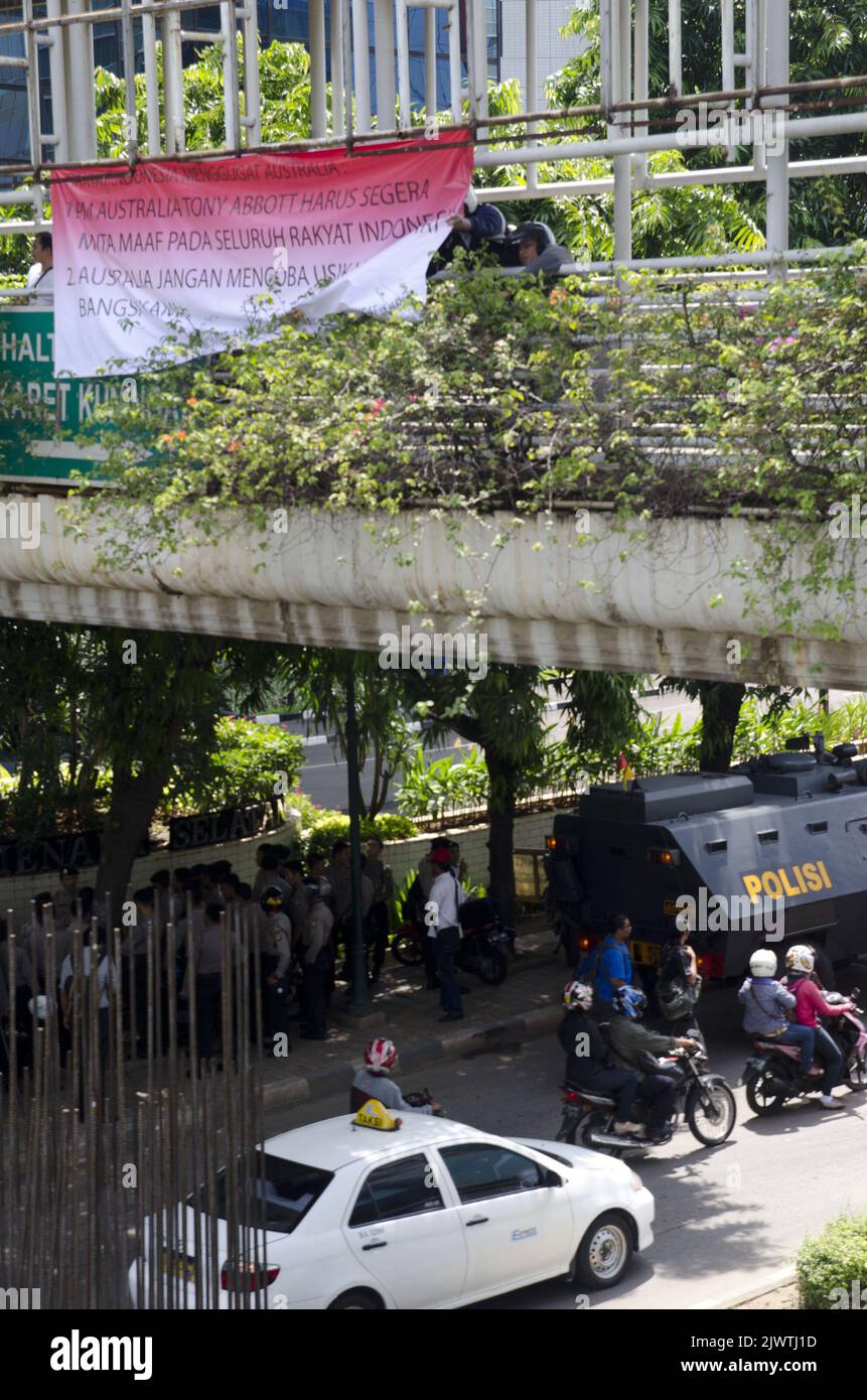 Protesters placing banners at the crossing bridge in front of ...