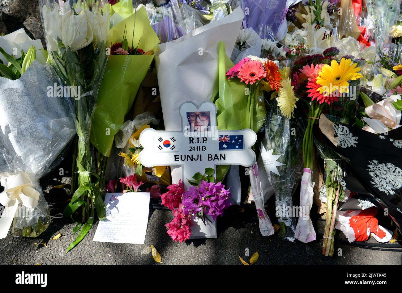 A cross bearing the name and photo of 22 year-old woman South Korean ...