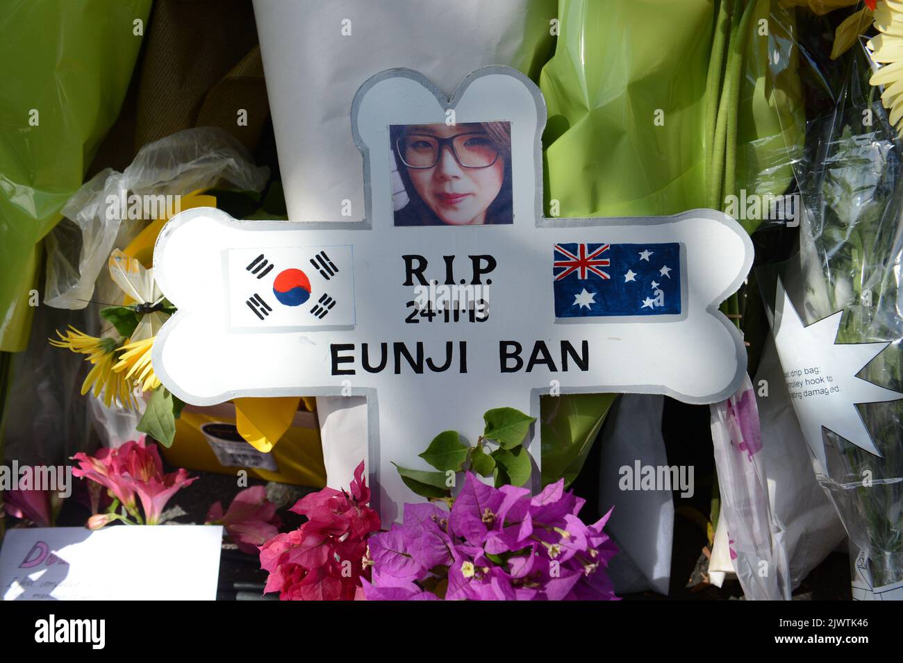 A cross bearing the name and photo of 22 year-old woman South Korean ...