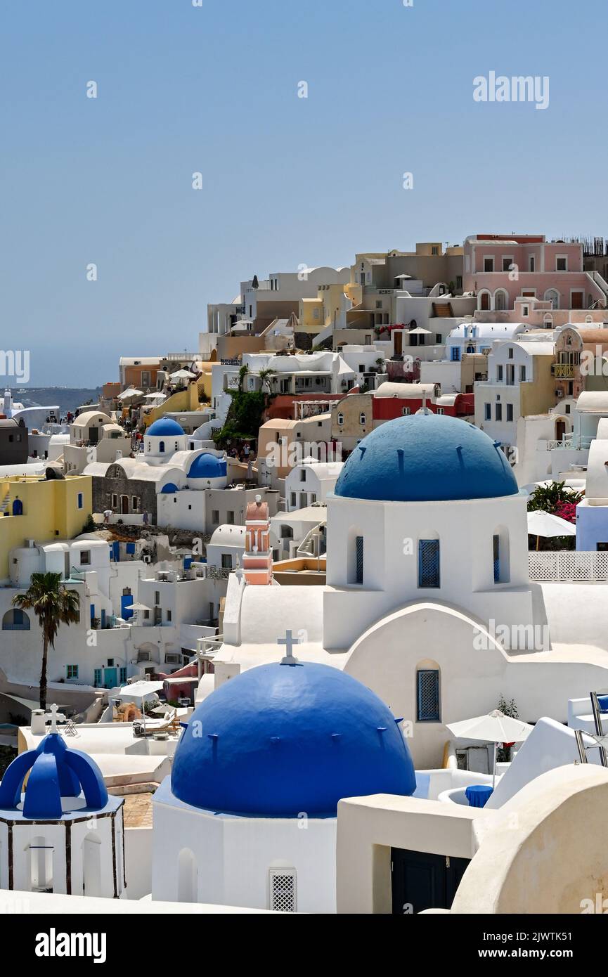 Oia, Santorini, Greece - June 2022: Traditional whitewashed buildings ...
