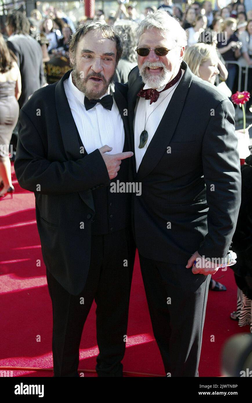 Actor John Rhys-Davies with producer Barry Osborne poses on the red ...